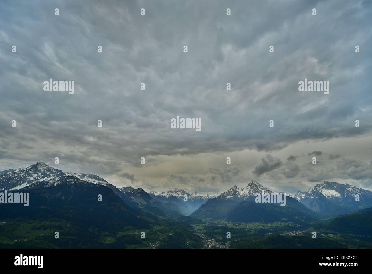 Berchtesgaden in the alps with cloudy sky Stock Photo - Alamy