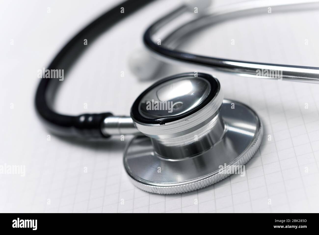 Close-up of a stethoscope on graph paper Stock Photo - Alamy