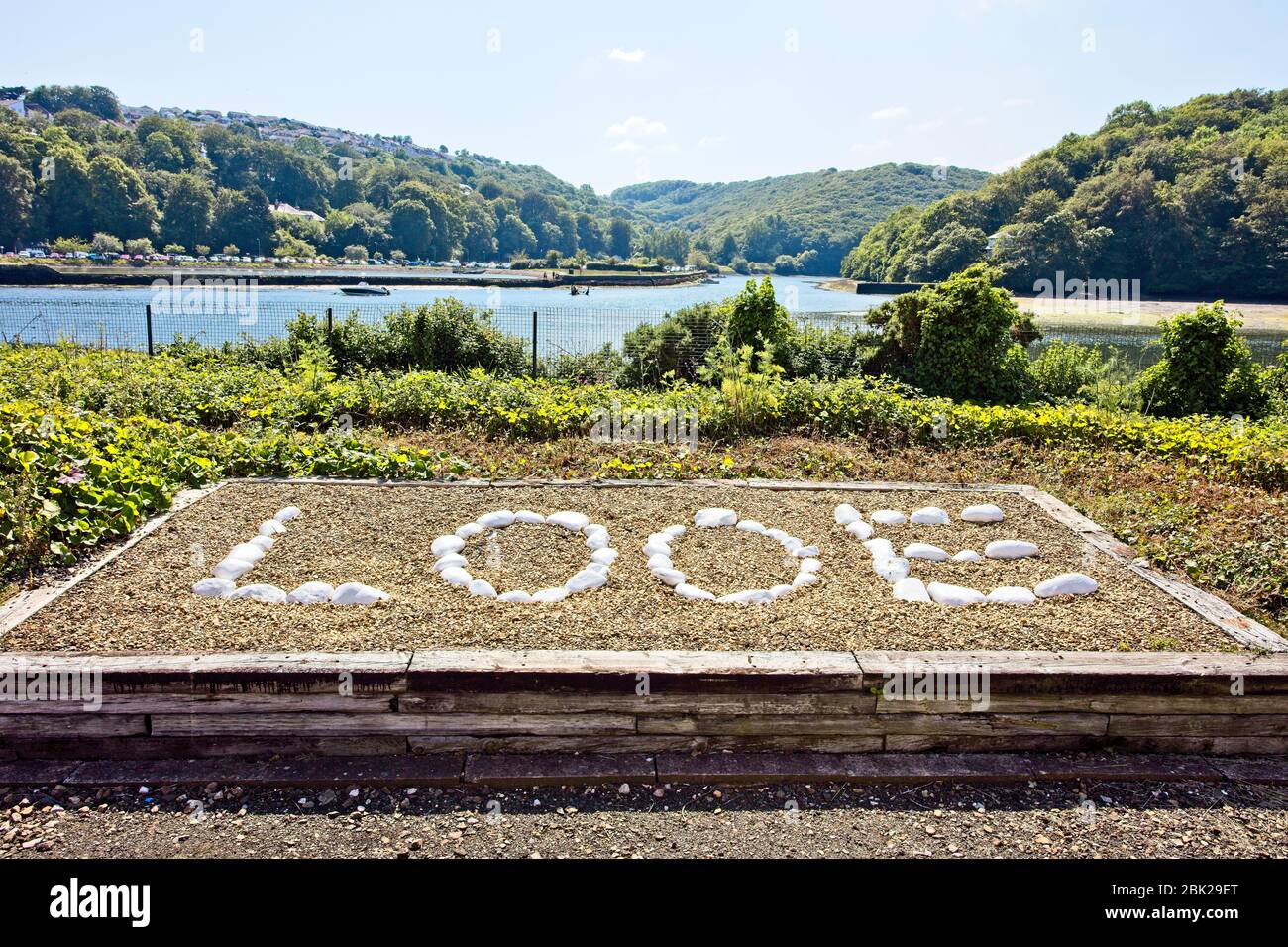 Sign at the entrance to East Looe by train, Cornwall, England, UK Stock ...