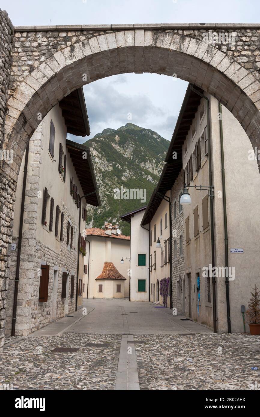 Via Roma and one of the medieval gates into the fortified town of ...