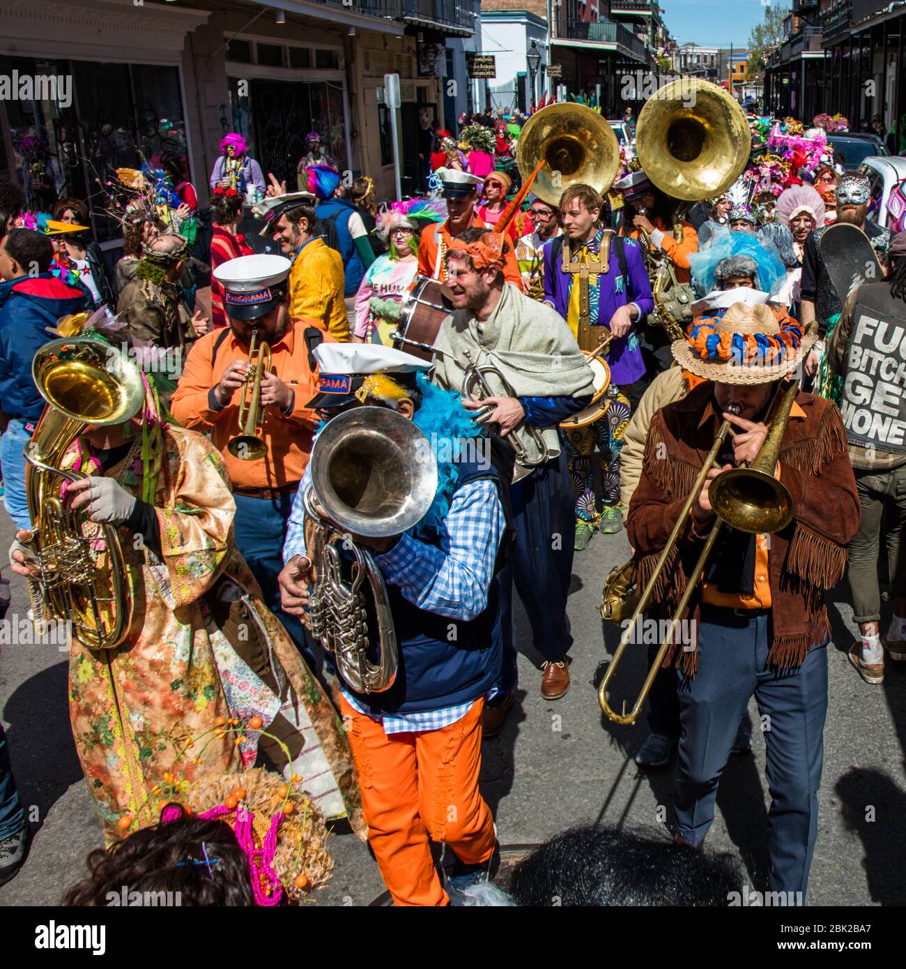 Street parade through French Quarters of New Orleans during Mardis Gras ...