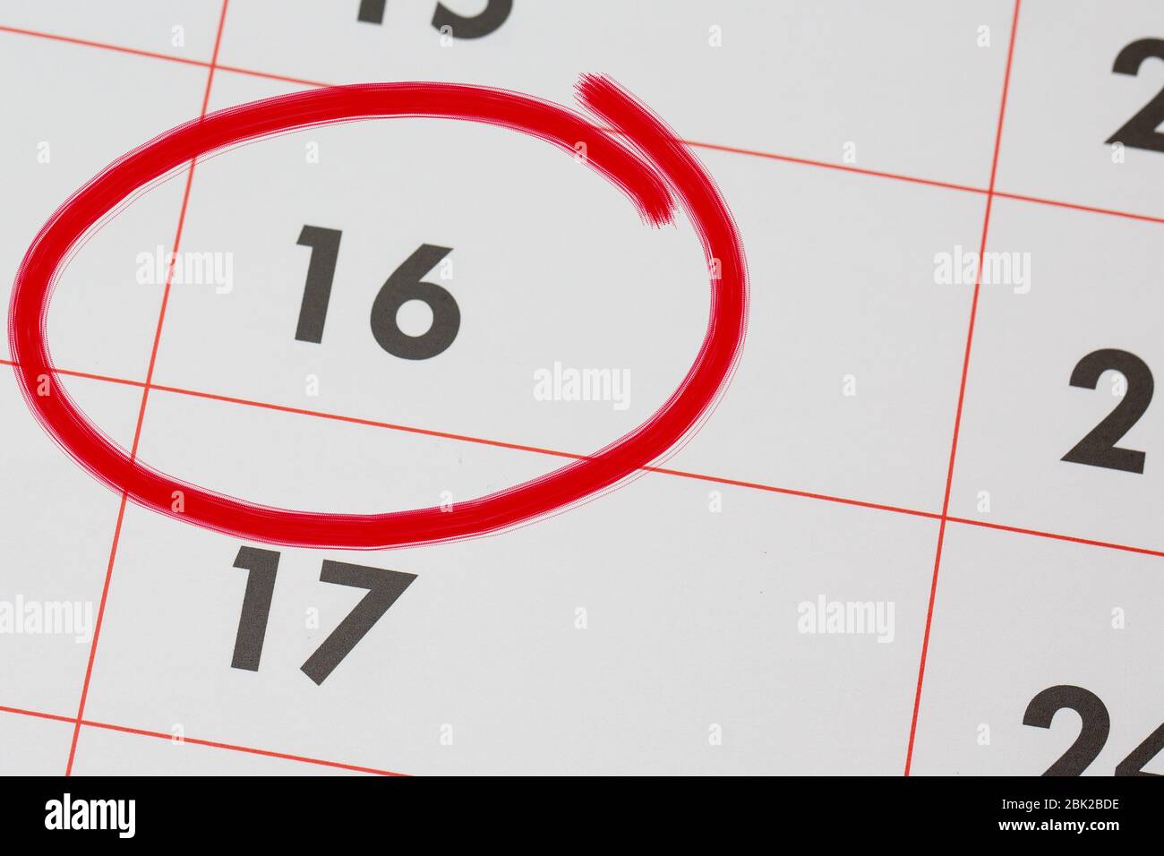 16th Date of the Month marked in red marker pen on a simple planner ...