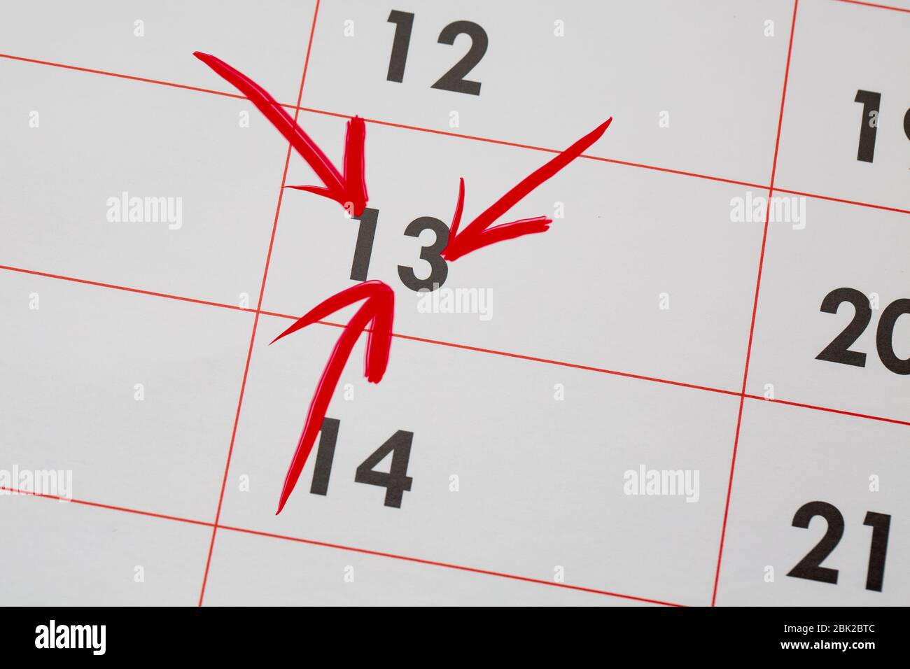 13th Date of the Month marked in red marker pen on a simple planner ...