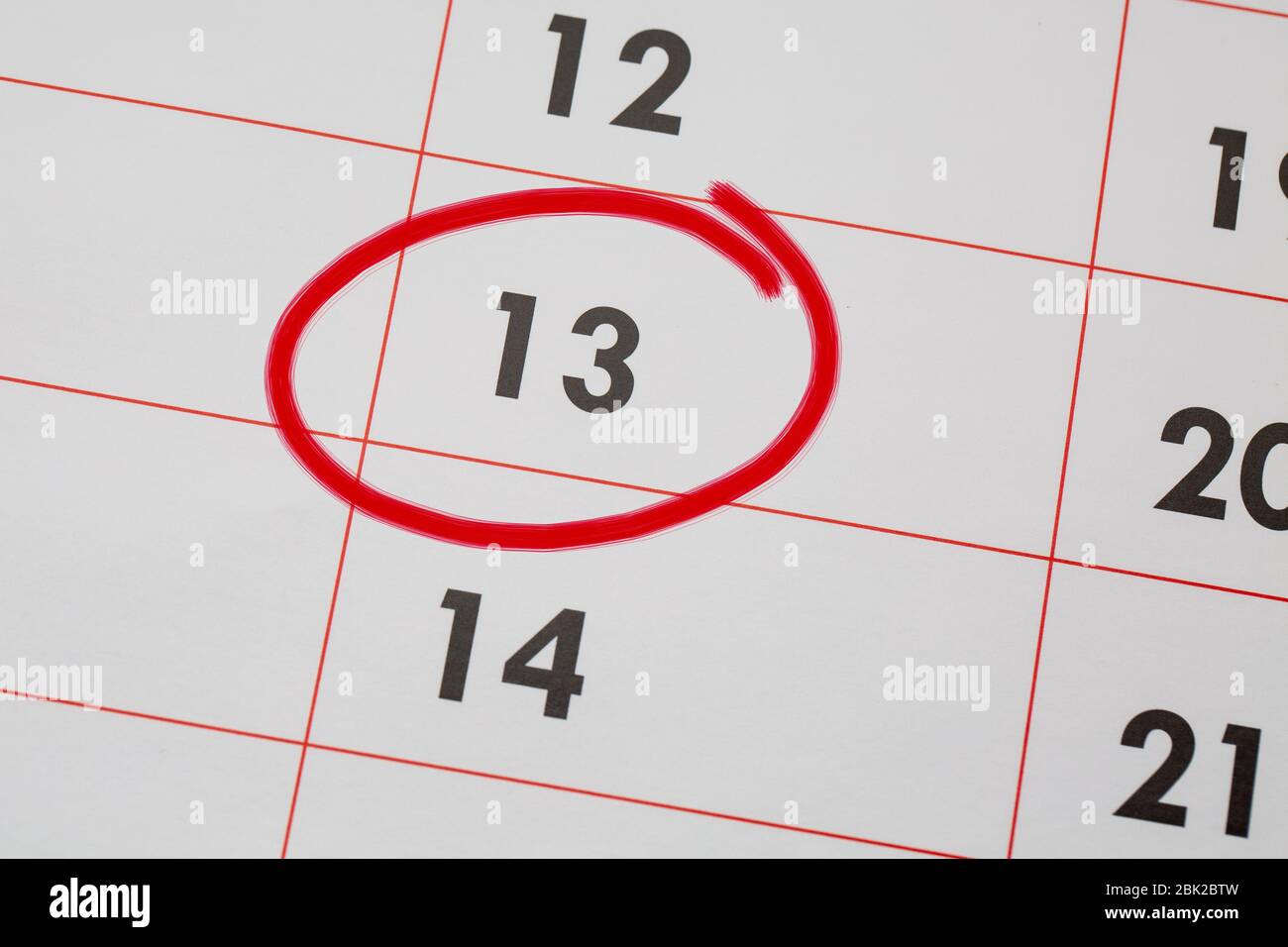 13th Date of the Month marked in red marker pen on a simple planner ...