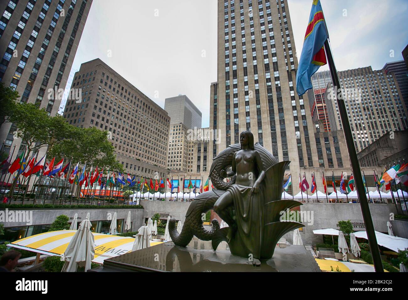 New York, USA – August 23, 2018: Rockefeller Center, flagpoles with ...