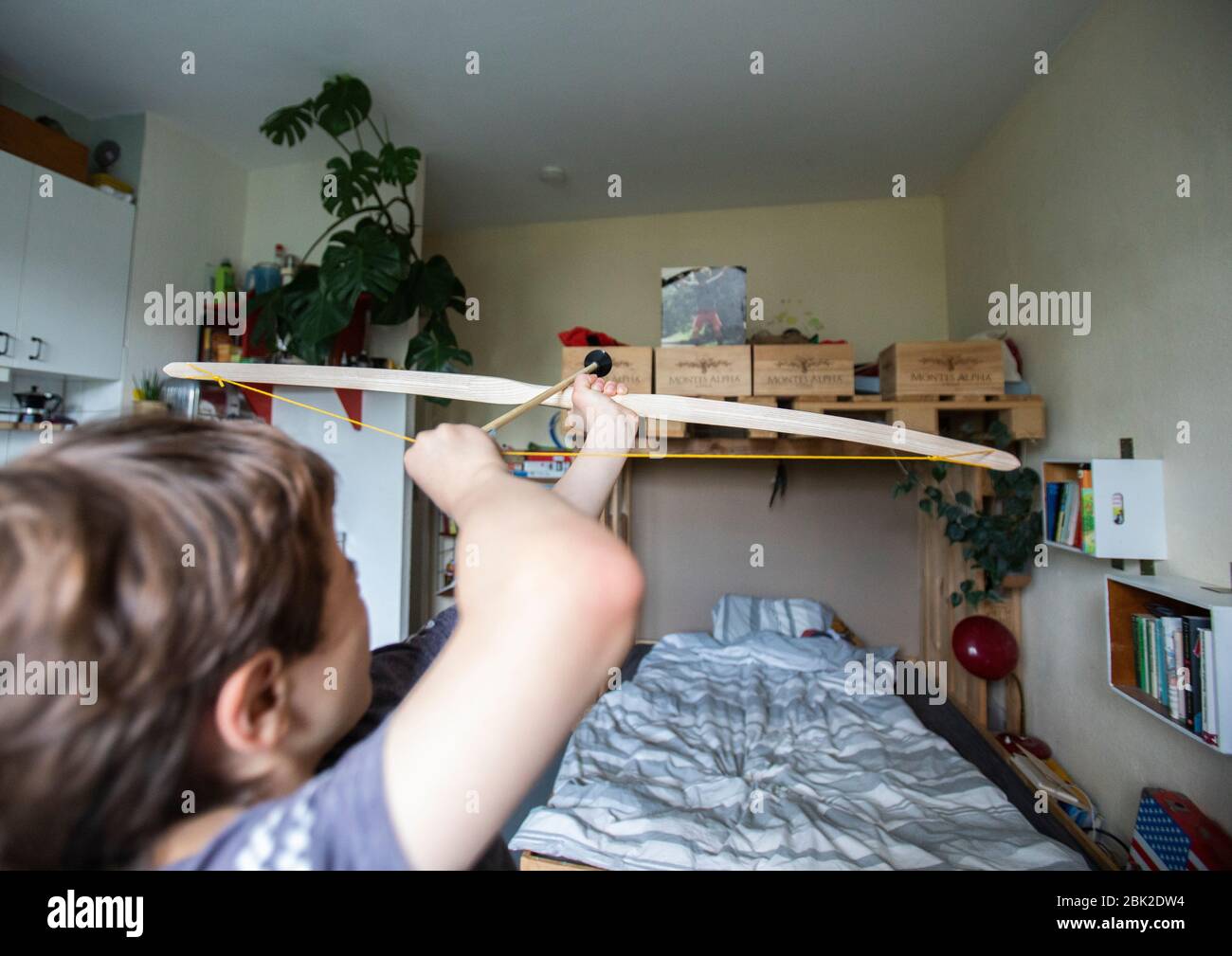 A boy doing archery Stock Photo - Alamy