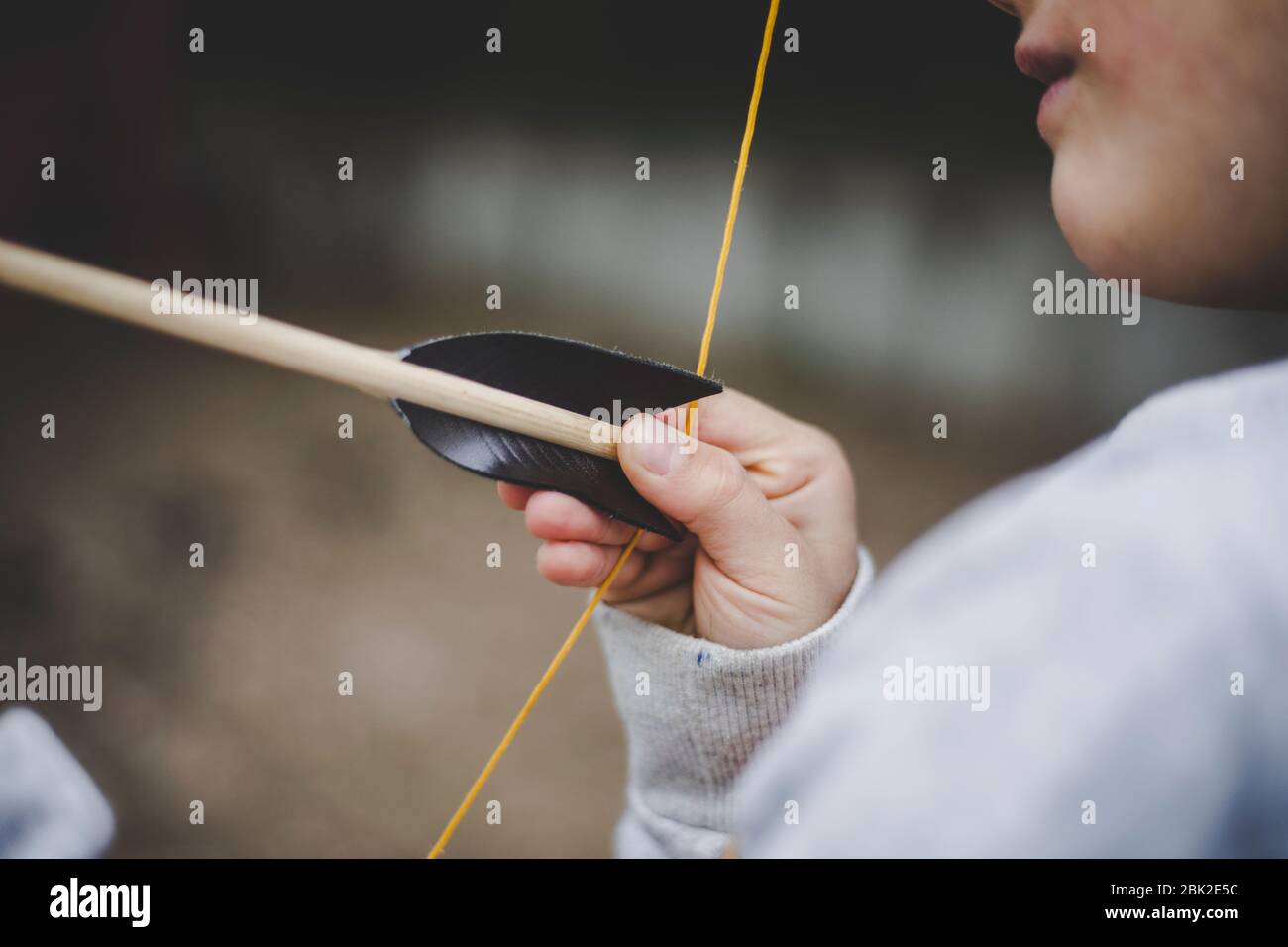 A boy doing archery Stock Photo - Alamy