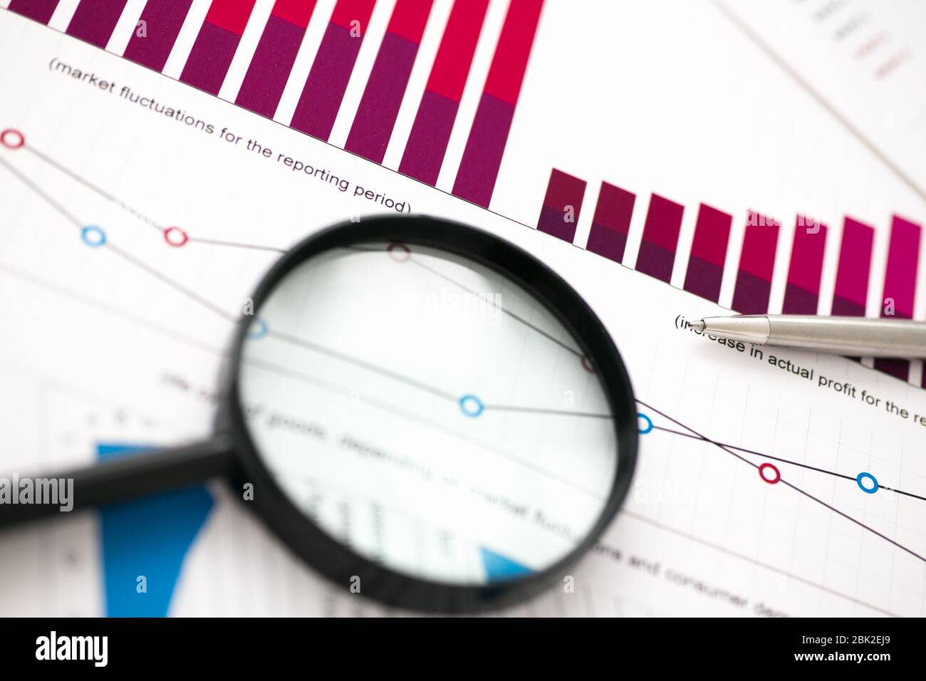 Financial statistics documents on table Stock Photo - Alamy
