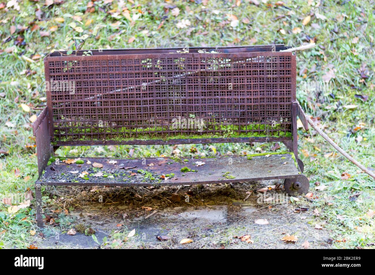 Abandoned old rusty grill waiting for summer Stock Photo - Alamy
