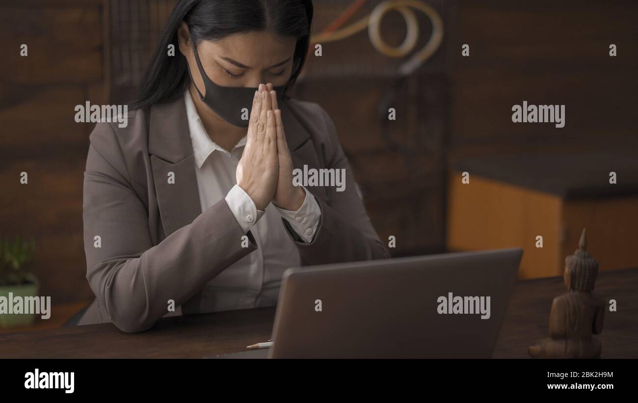 Praying Business Woman sitting In Office Before computer Stock Photo ...