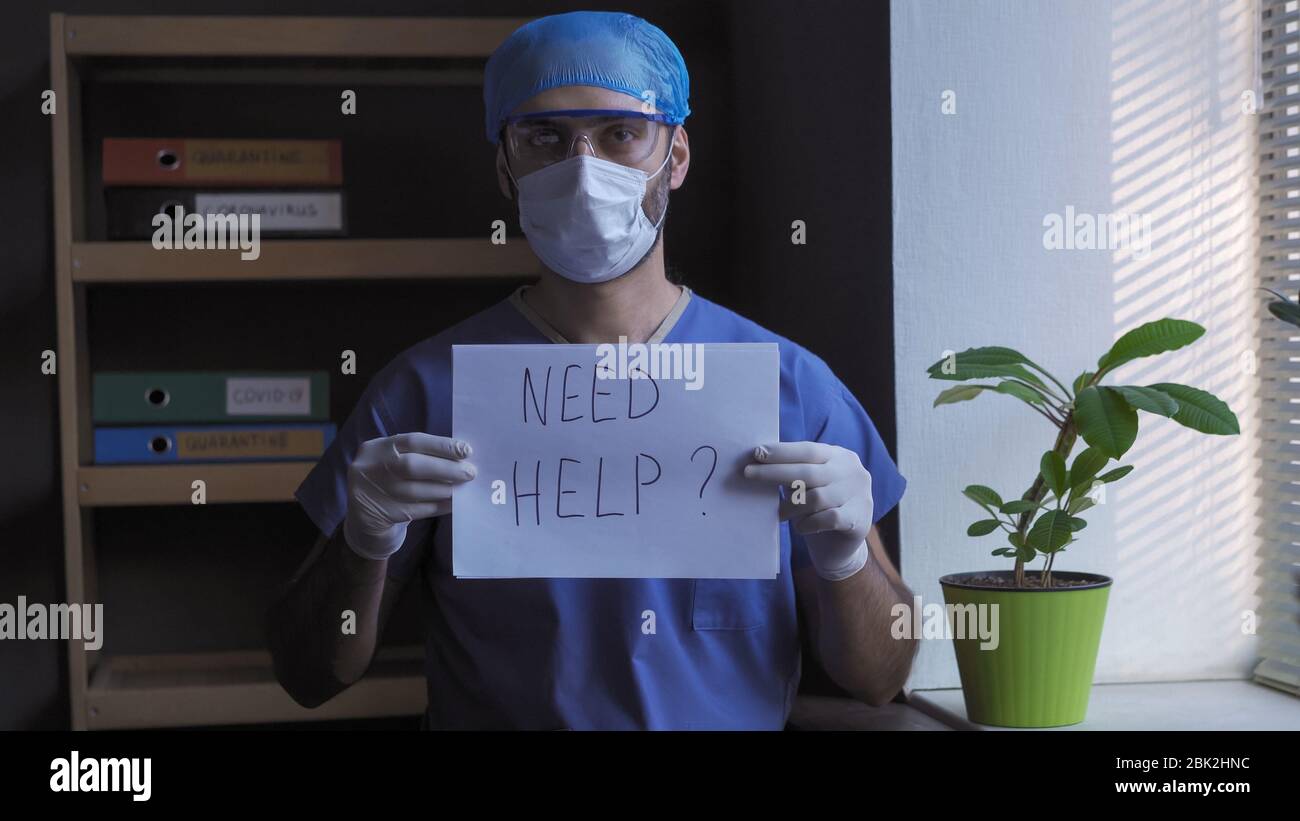 Doctor Holding Paper Blank With Offer Help Stock Photo - Alamy