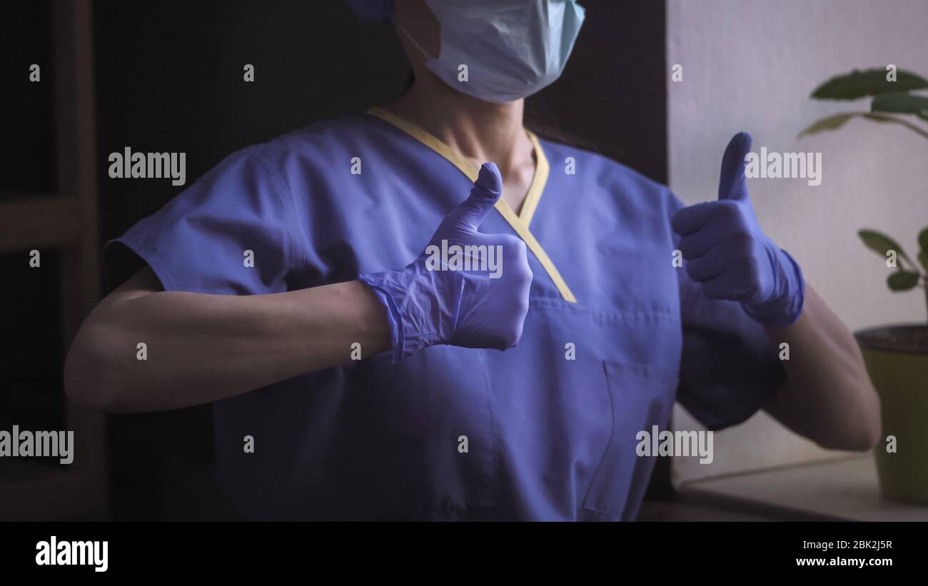 Health care worker shows hi-res stock photography and images - Alamy