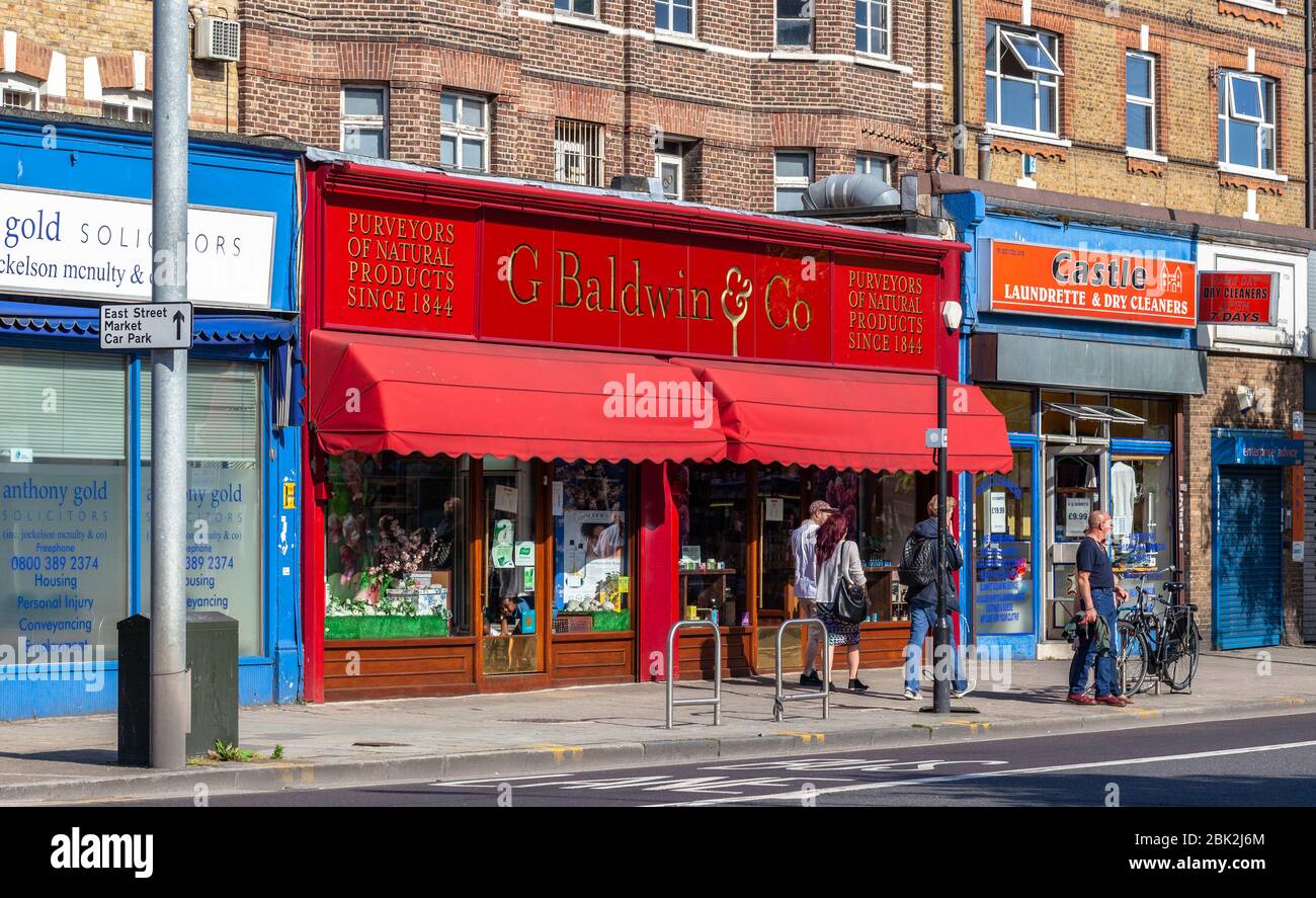 Row of shop on a high street, London, England, UK Stock Photo - Alamy