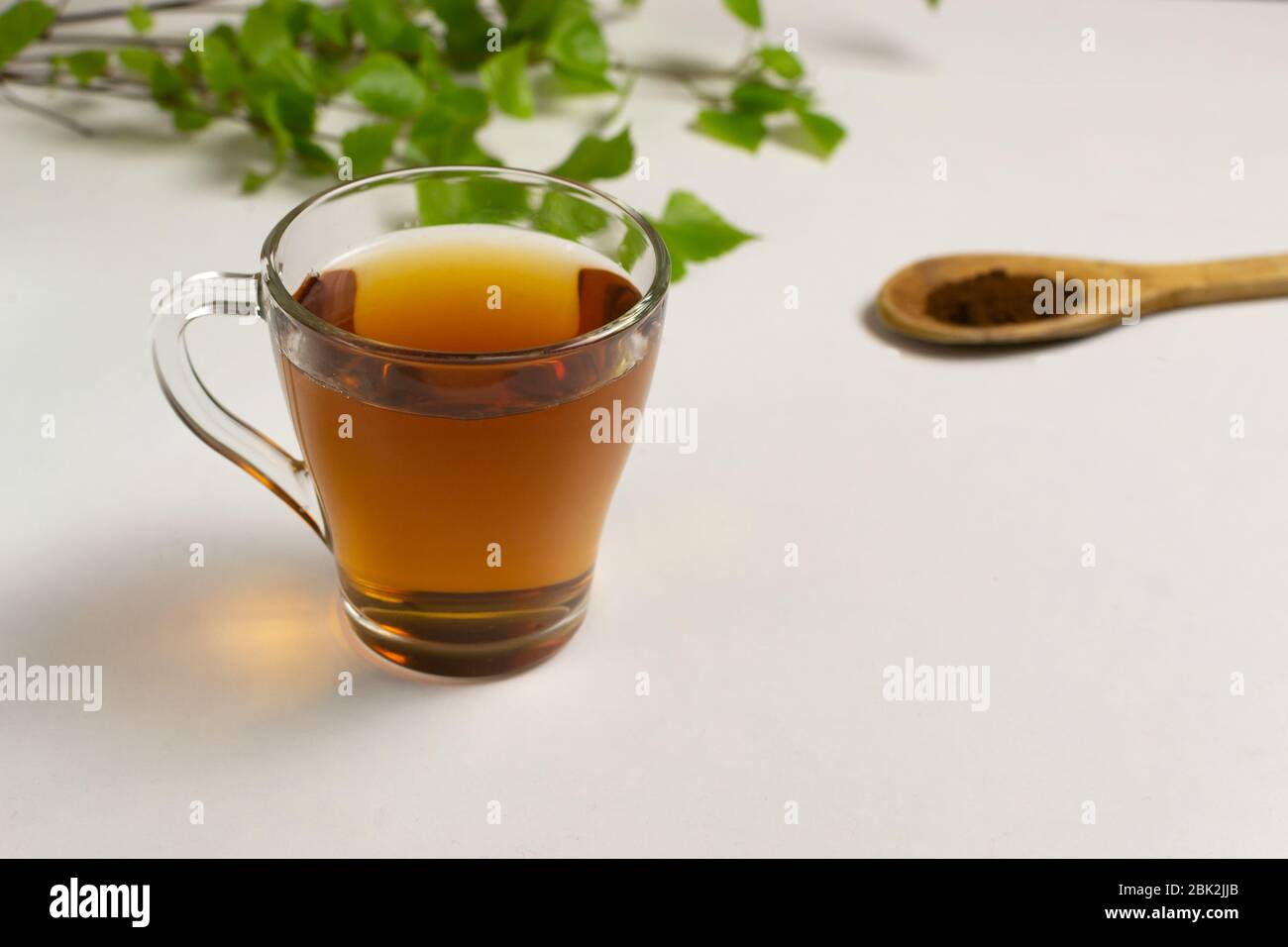 Chaga powder tea in a transparent cup. Horizontal orientation Stock ...