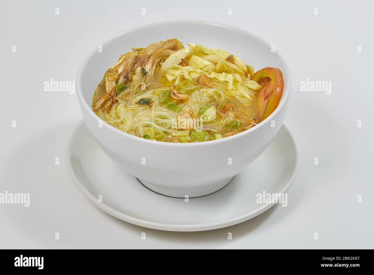 A bowl of soto ayam, traditional soup dish that is commonly found ...