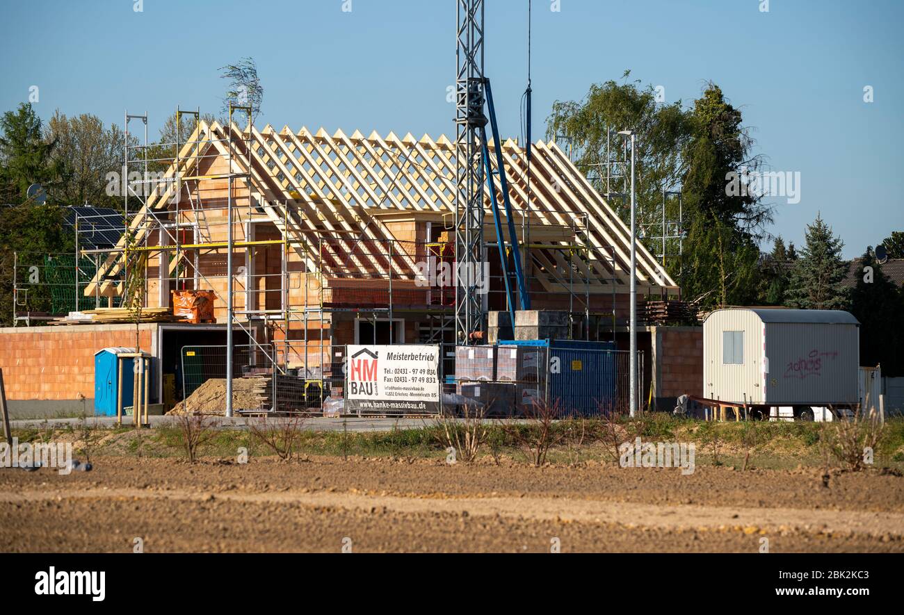 New construction of a single family house, shell, with roof truss ...