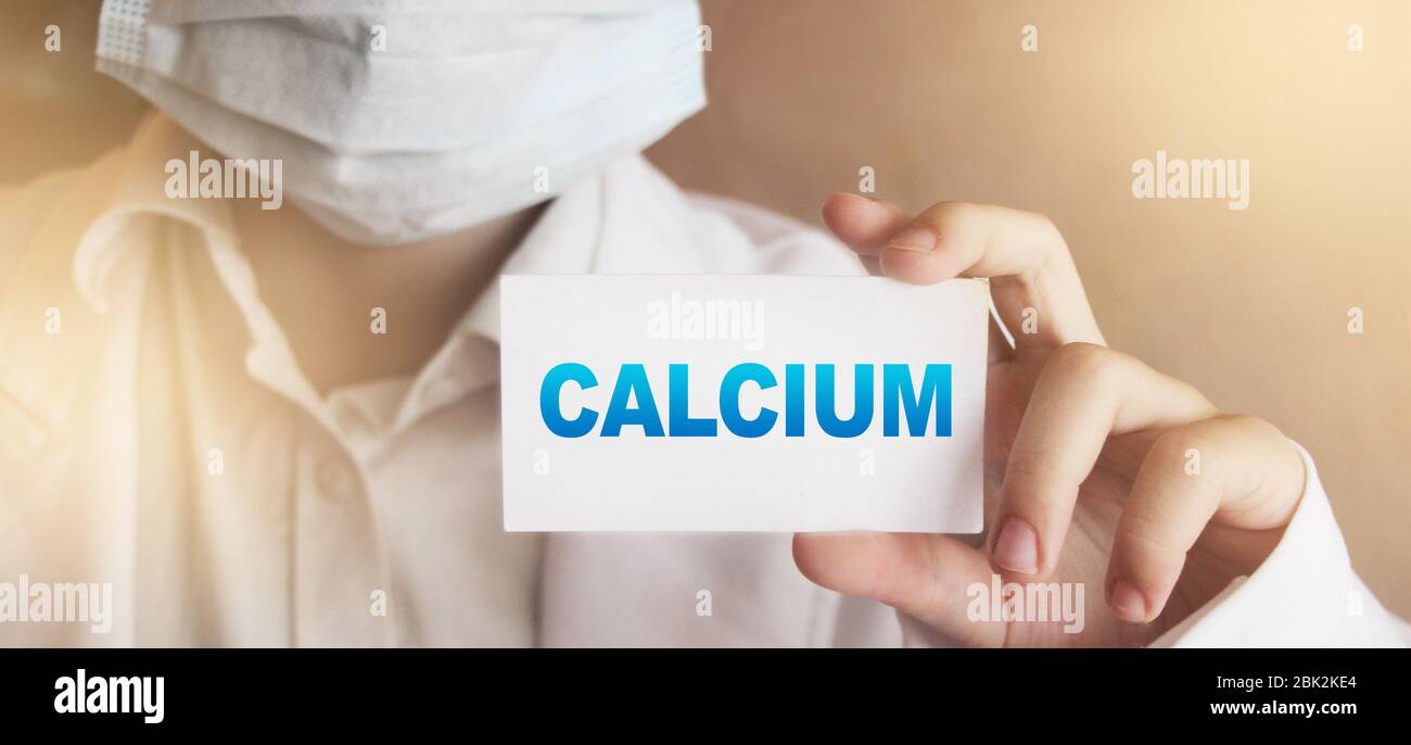 Calcium on card Doctor keeps in hand. Selective focus. Medical ...