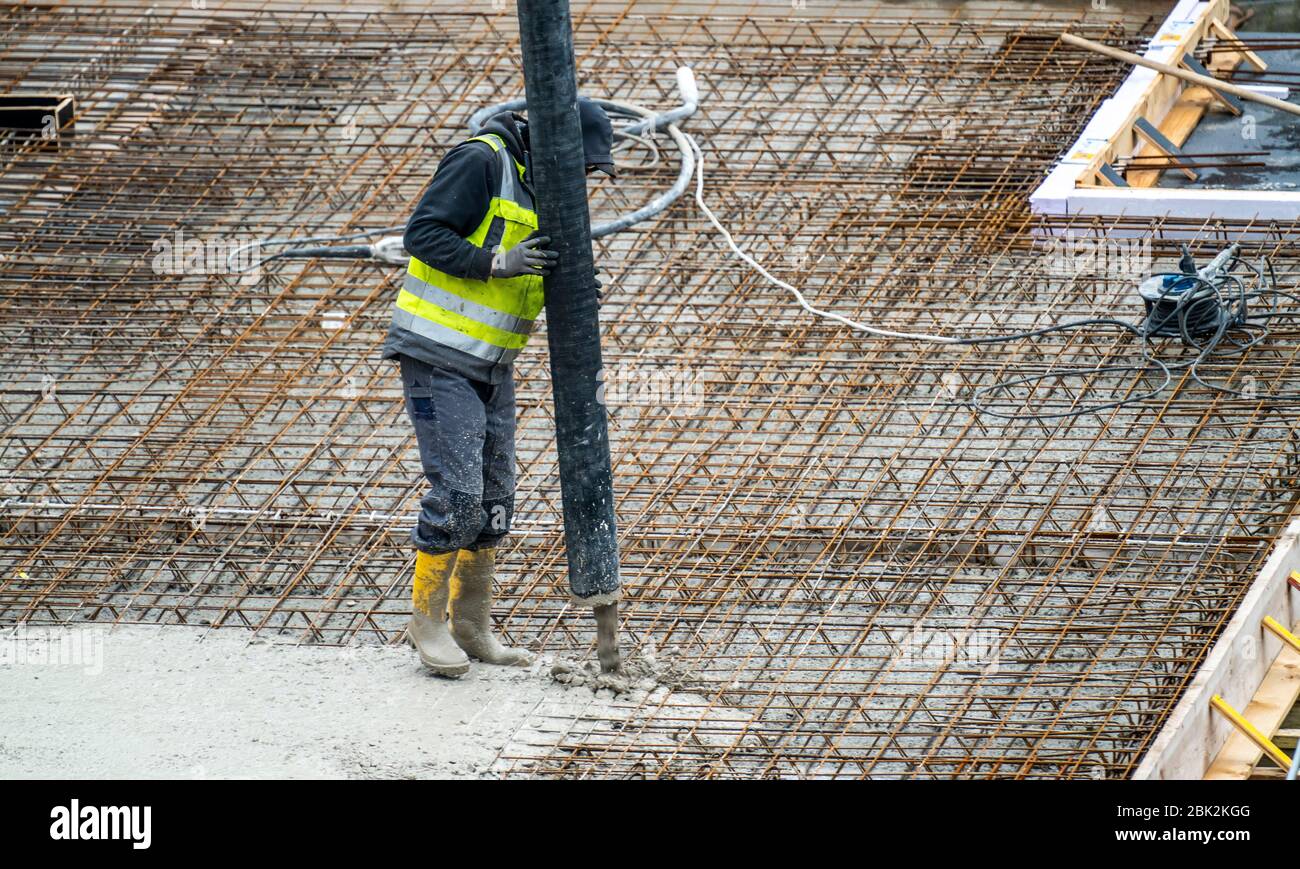 Construction site, concreting, the floors ceiling of a building is ...