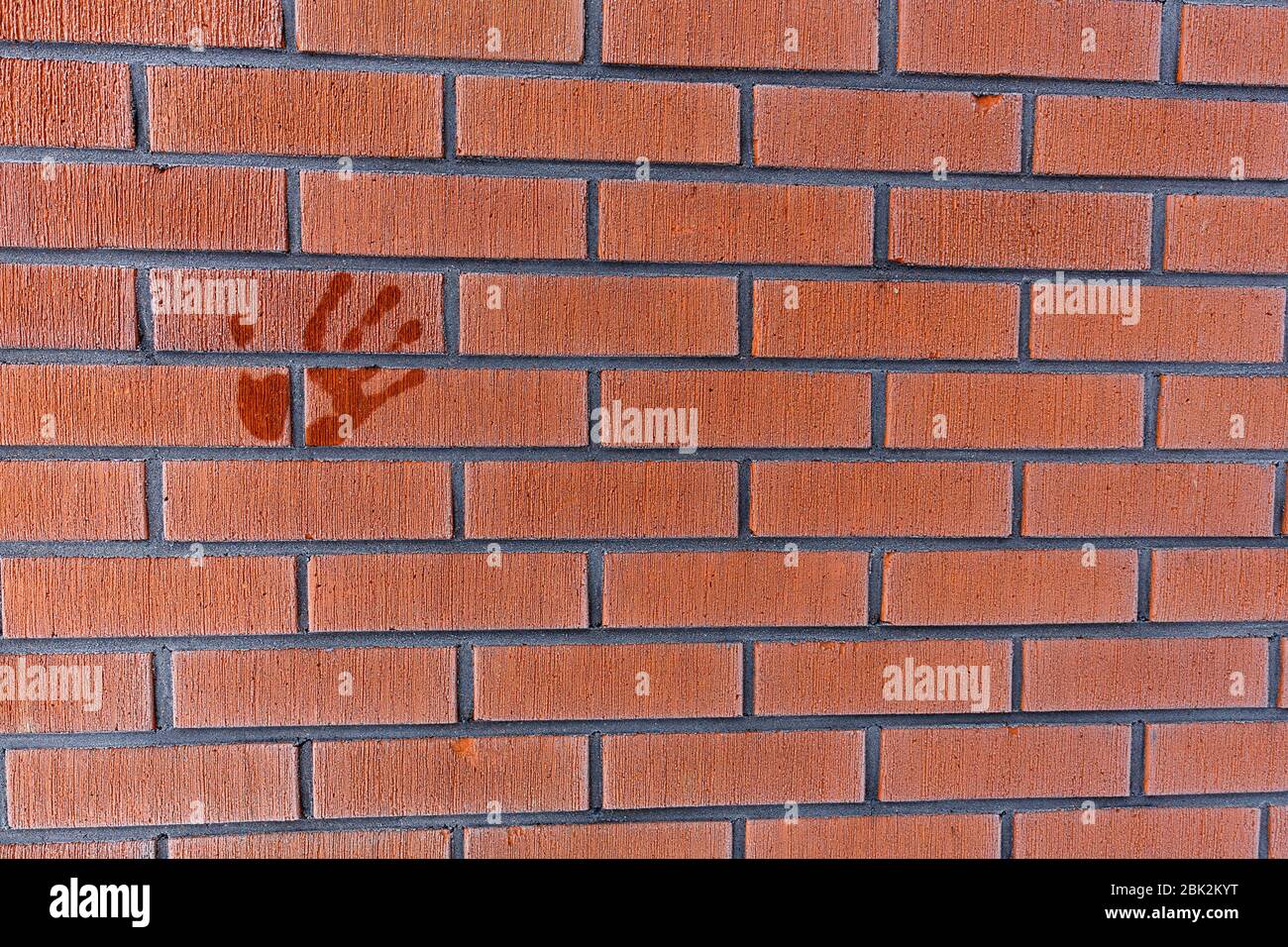 Wet melted palm print on frosty red tile wall at Winter , Finland Stock ...