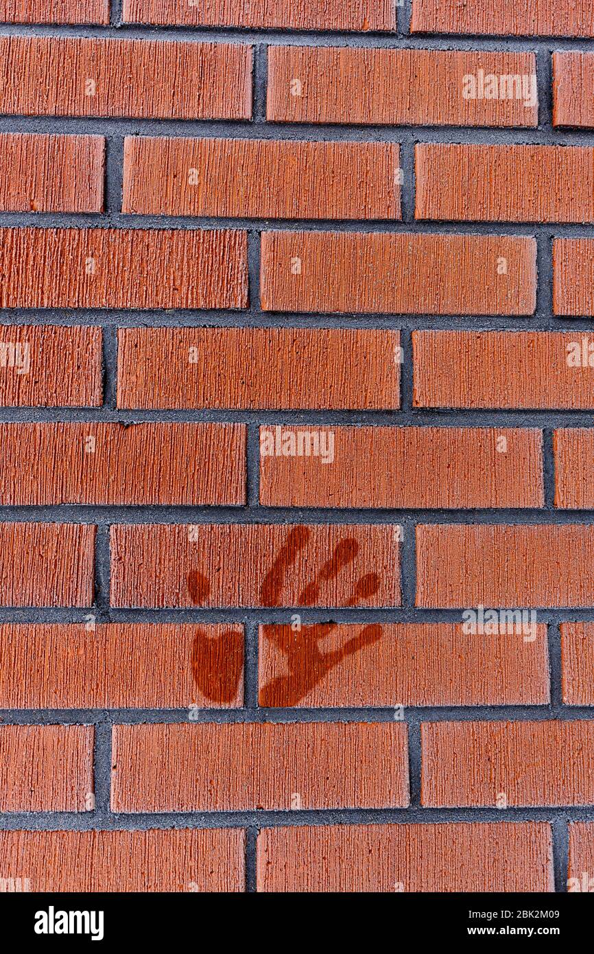 Wet melted palm print on frosty red tile wall at Winter , Finland Stock ...