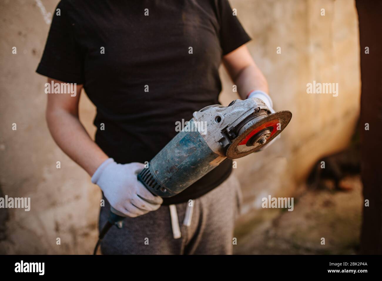 Man working angle grinder wooden hi-res stock photography and images ...