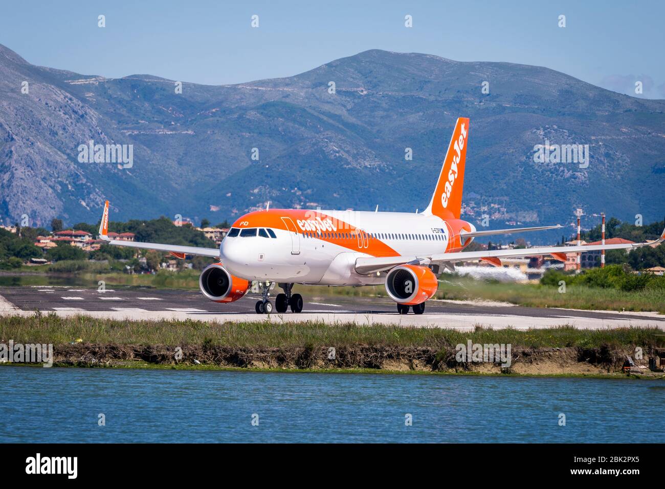 EasyJet aeroplane taxiing on the runway at Corfu International Airport ...