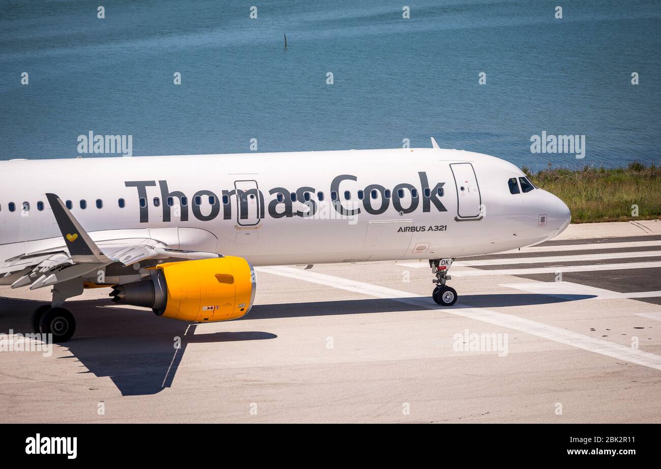 Thomas Cook Airbus A321 aeroplane taxiing on the runway at Corfu ...