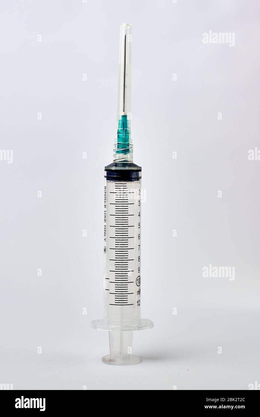 closeup of syringe medical injection tool isolated on white background ...