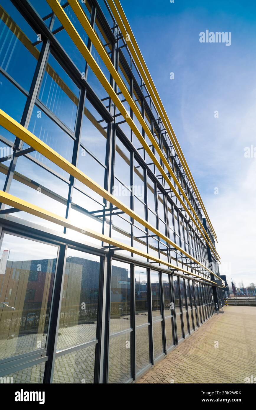 exterior of a modern office building with yellow decorations Stock ...