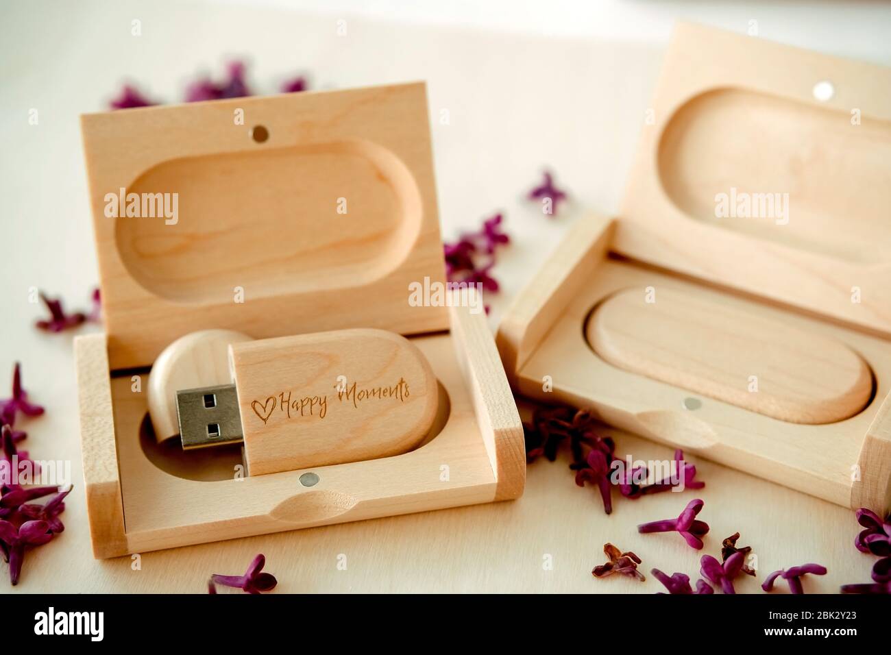 Wooden brown usb flash drives with boxes with the text Happy Moments ...