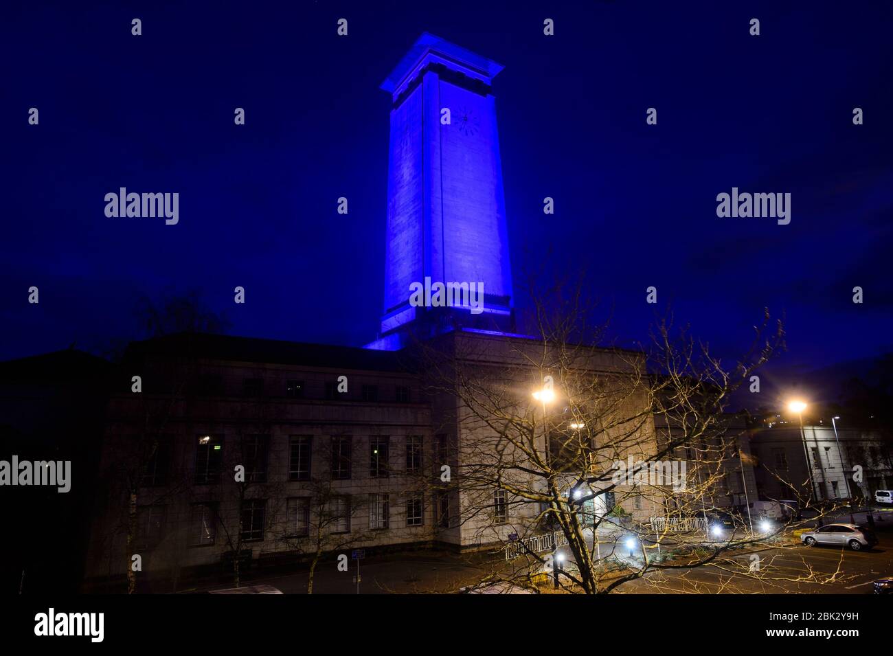 02.04.20 - The clock tower of the Newport Civic Centre is illuminated ...