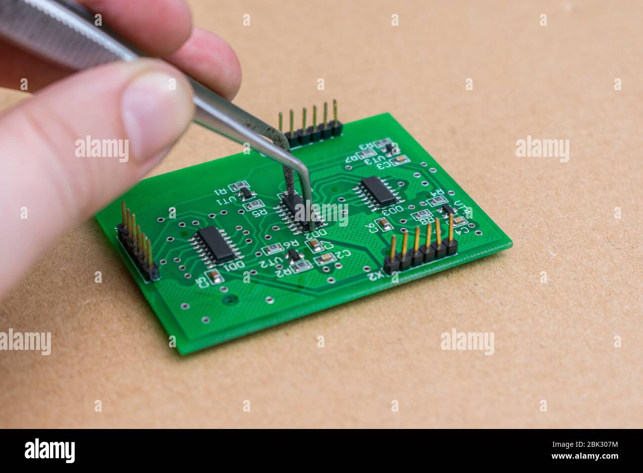 The process of replacing electronic components on the motherboard with ...