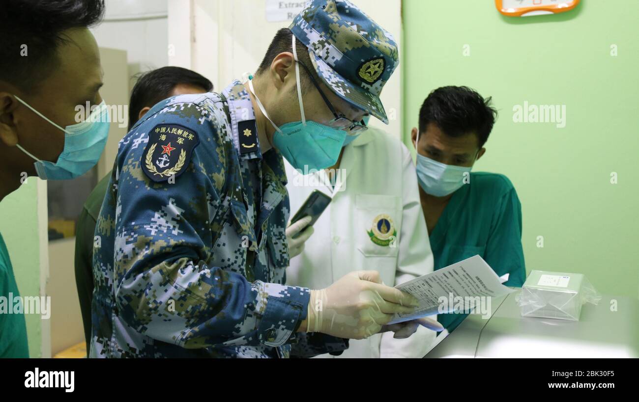 Yangon, Myanmar. 30th Apr, 2020. A member of a Chinese military medical ...