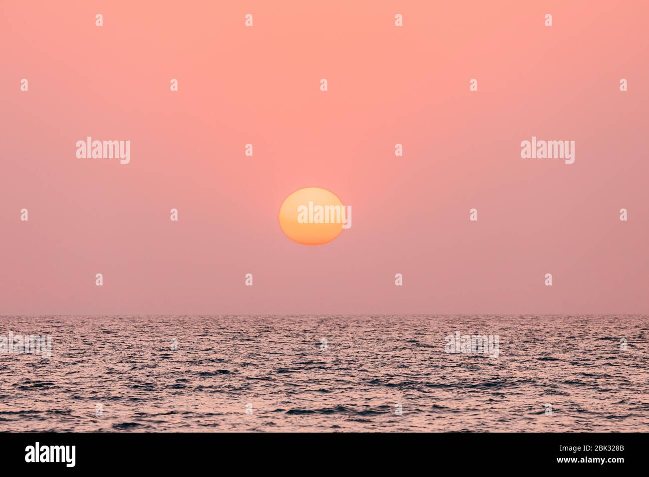 Natural Color Sunset Sunrise Sky Over Sea. Seascape With Shining ...