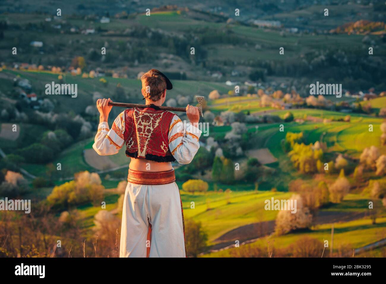 Traditional Folk dress in spring morning landscape. Hrinova, Slovakia ...