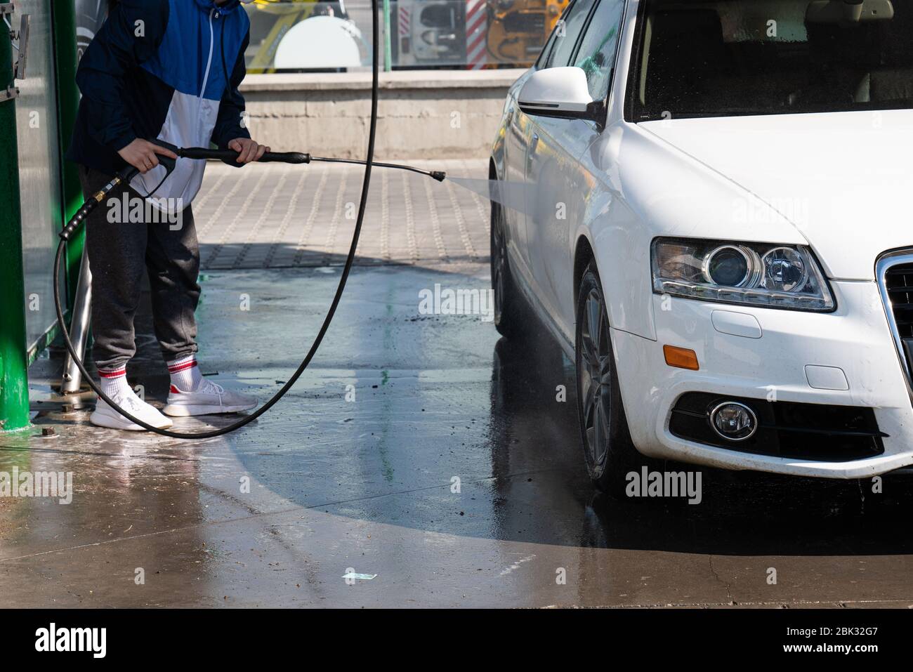 European casual man male washing his white transportation Stock Photo ...