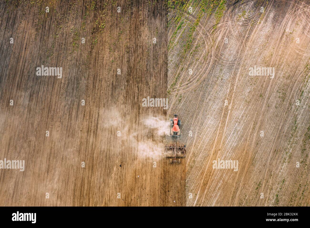 Aerial Flat View. Tractor Plowing Field In Spring Season. Beginning Of ...