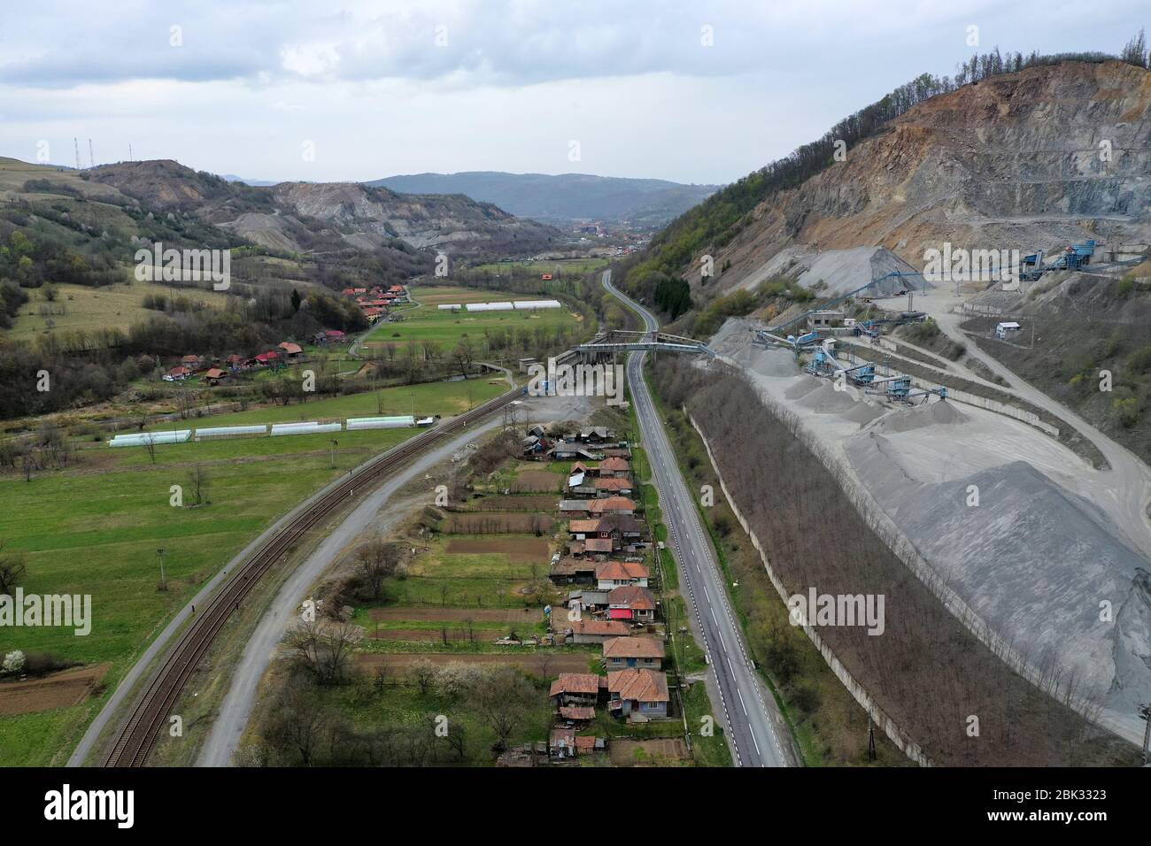 Aerial view over the only granite quarry in Transylvania located in ...