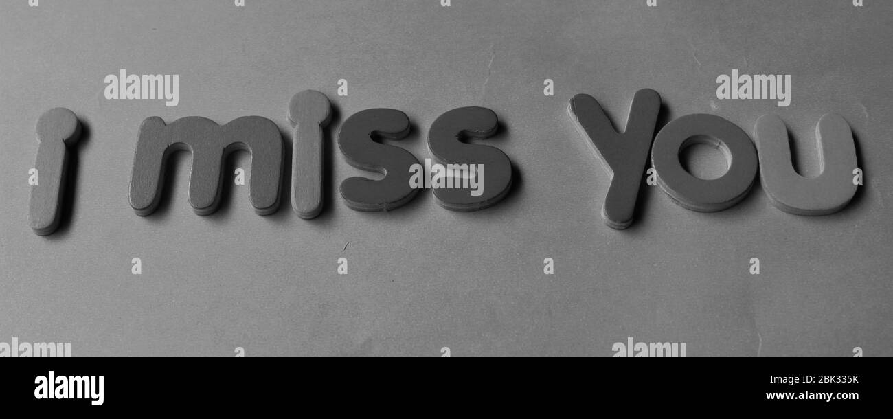 I miss you on red background. I miss you concept. Colored letter ...