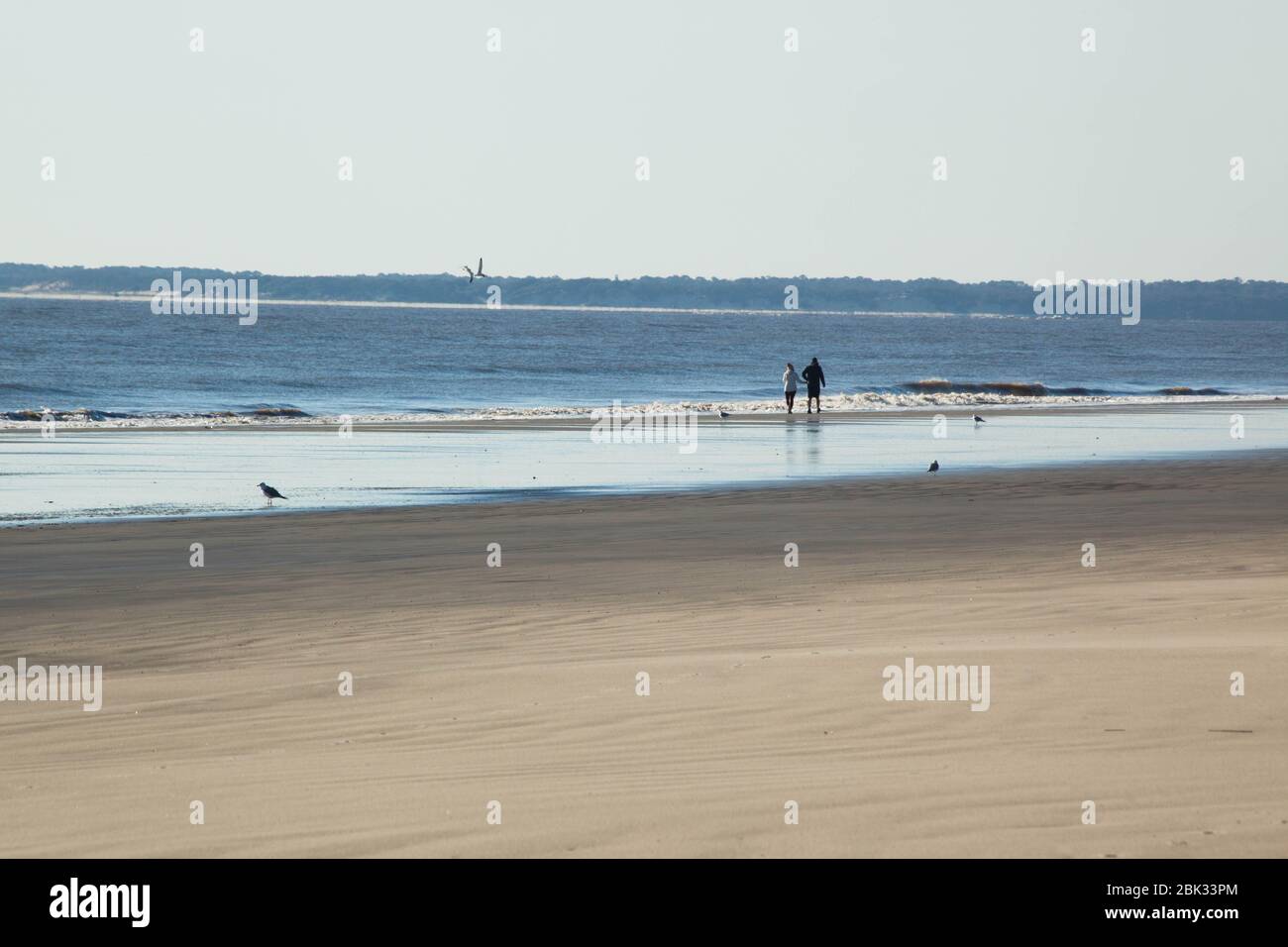 Two people at the beach hi-res stock photography and images - Alamy