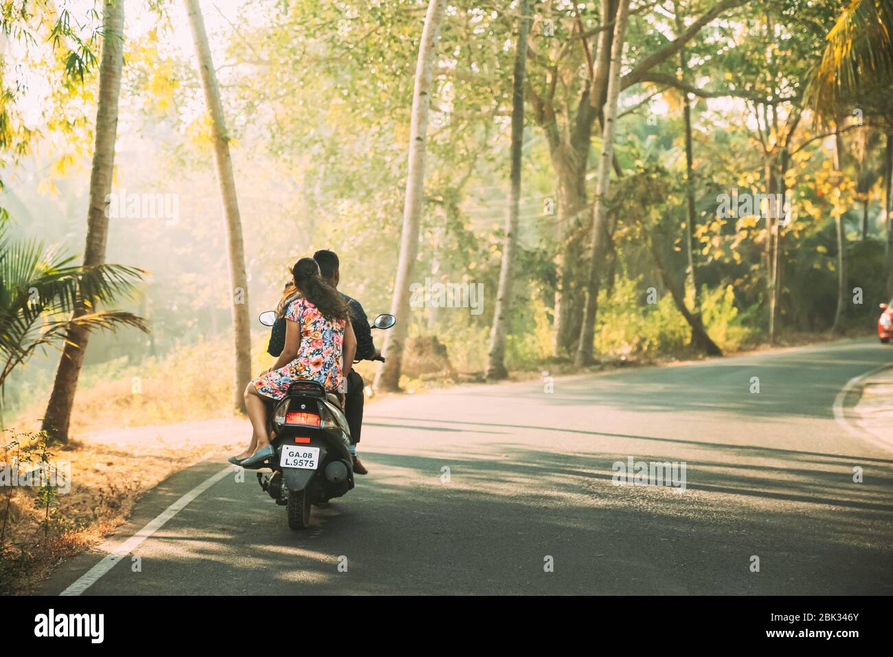 Indian woman on motorbike hi-res stock photography and images - Alamy