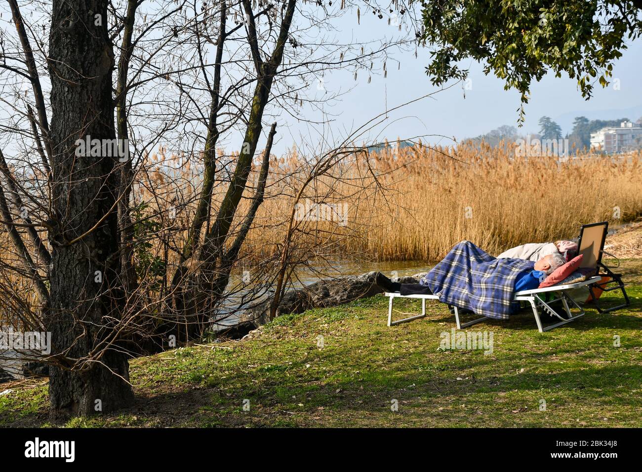 Man sleeping in cot in hi-res stock photography and images - Alamy