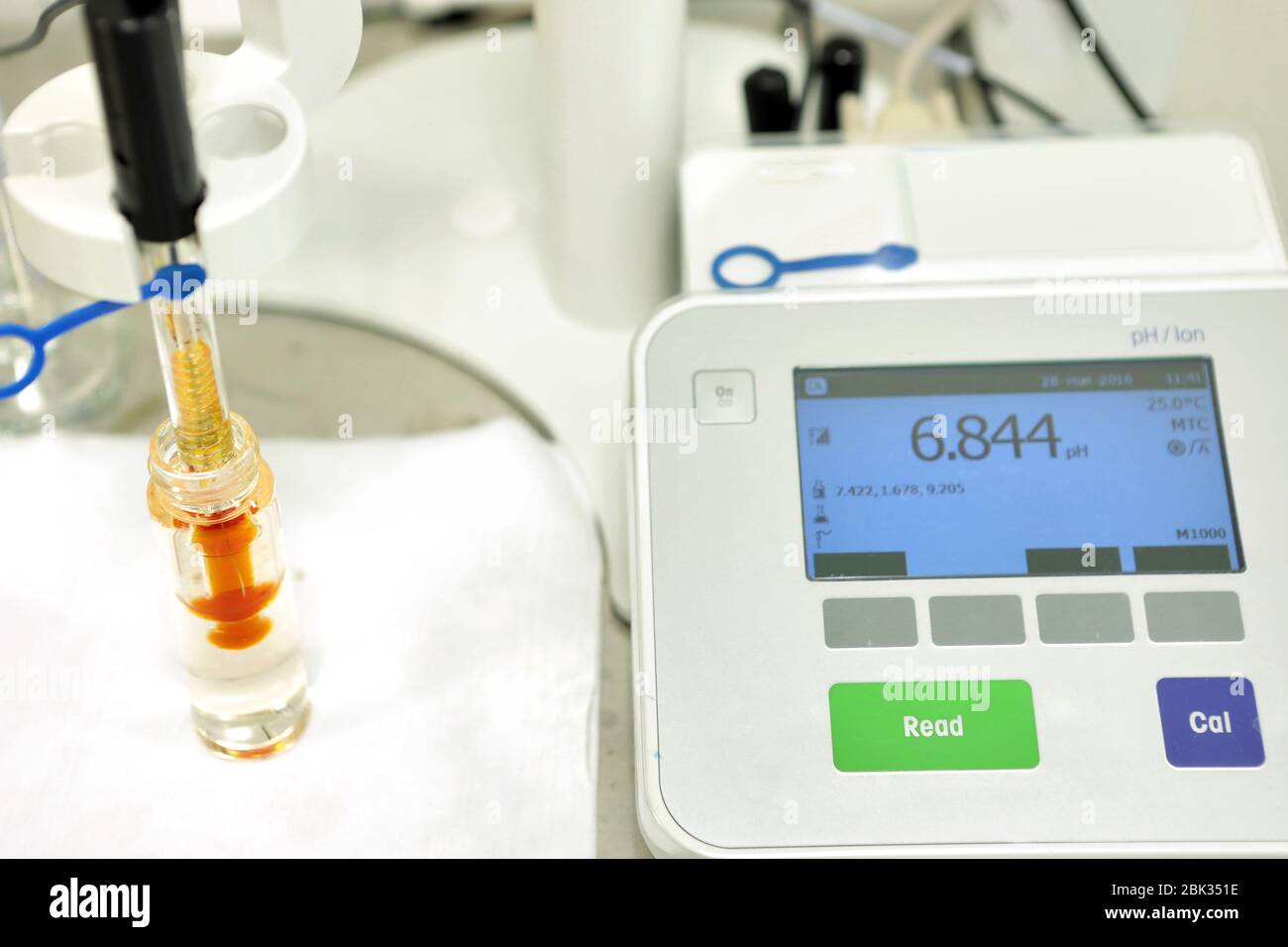 A chemist conducts a study of the stiffness of the solution. Laboratory ...