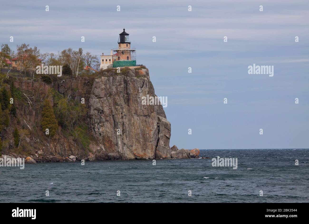 Split Rock Lighthouse on a cliff along Lake Superior under renovation ...