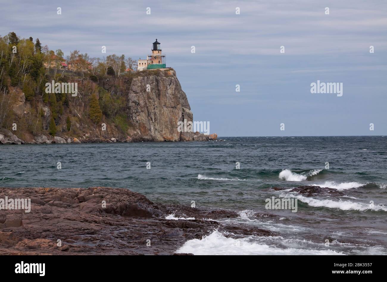Split Rock Lighthouse on a cliff along Lake Superior under renovation ...