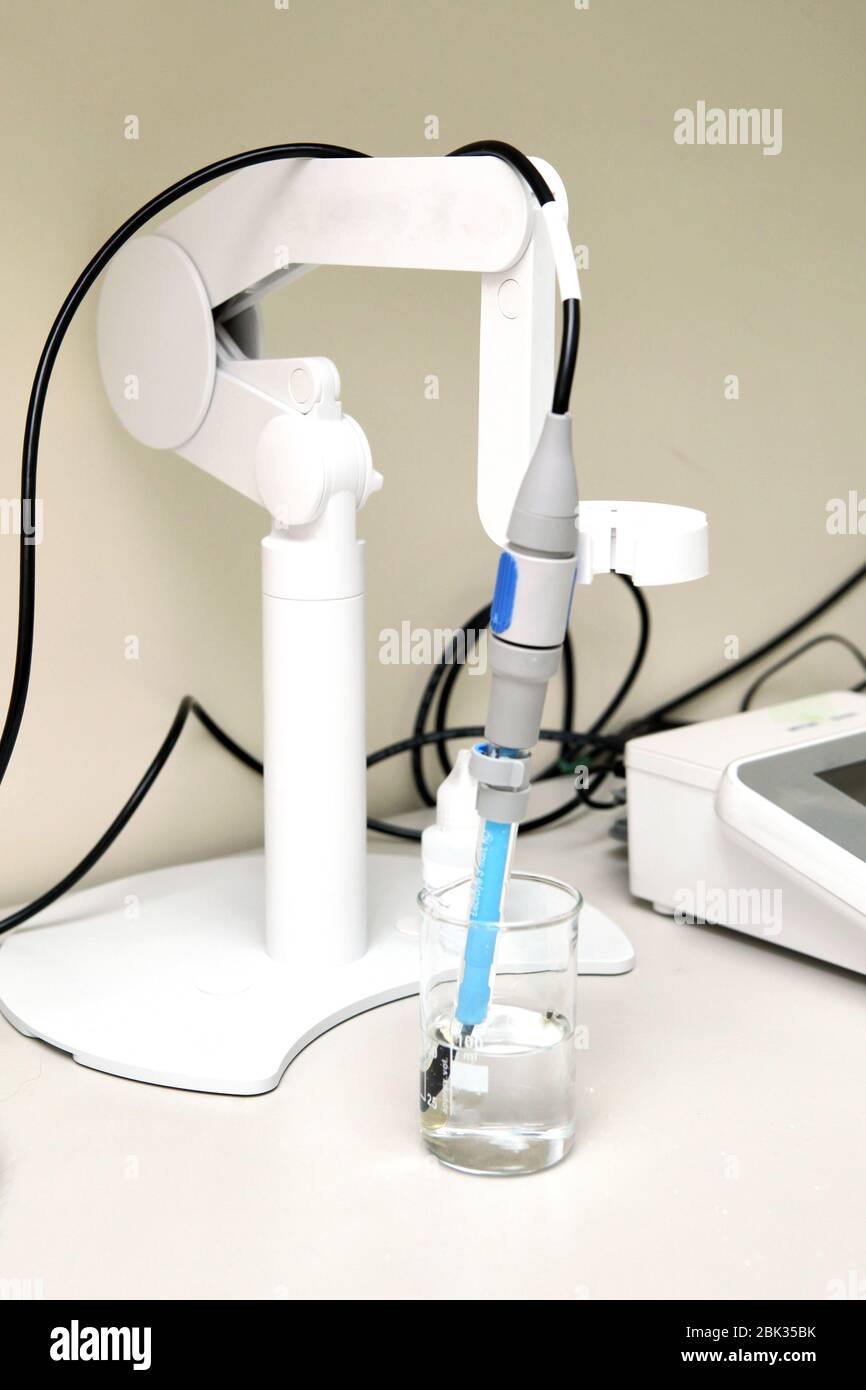 A chemist conducts a study of the stiffness of the solution. Laboratory ...