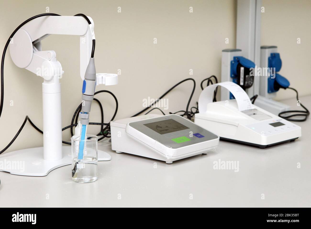 A chemist conducts a study of the stiffness of the solution. Laboratory ...