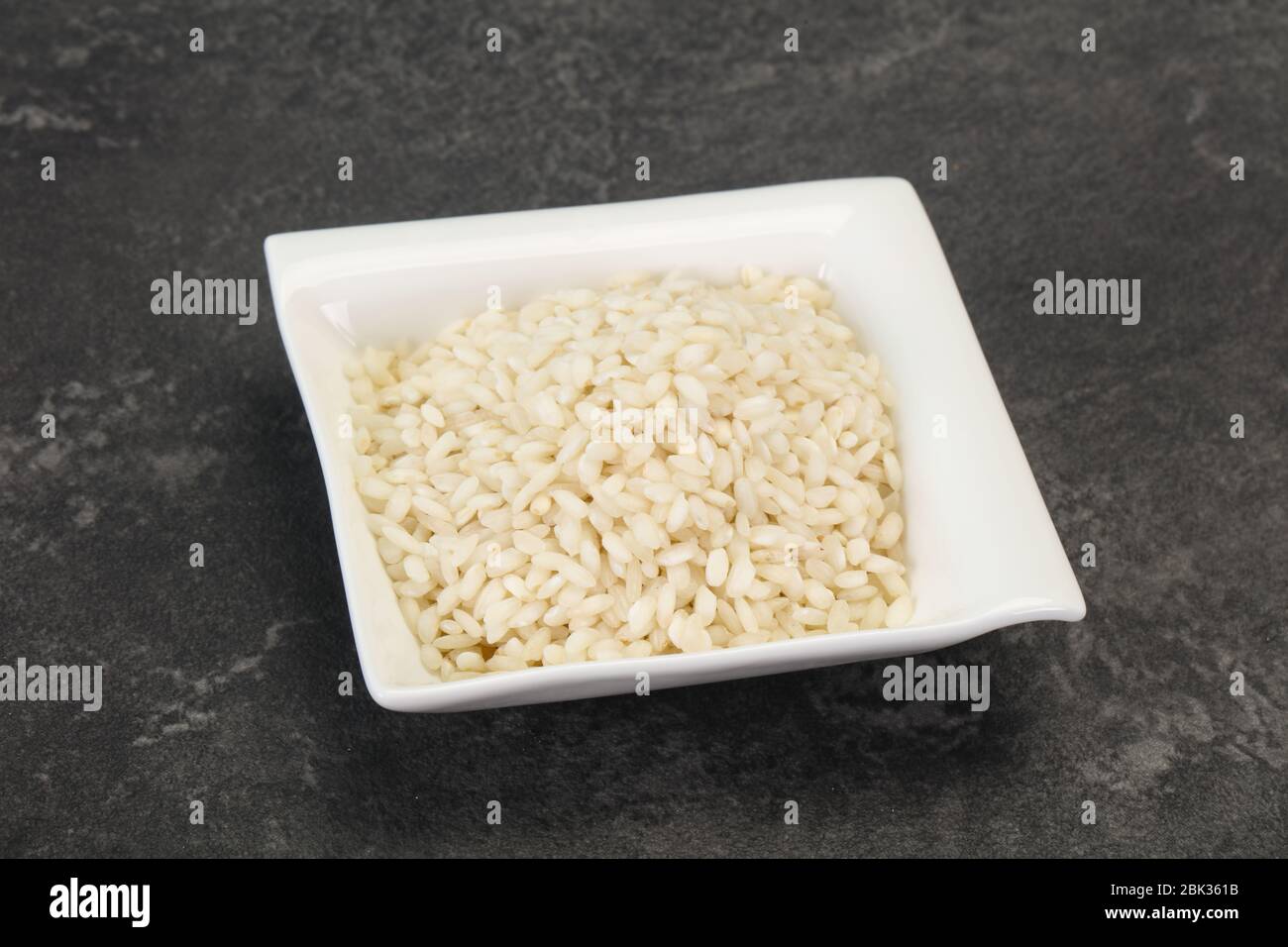 Raw Arborio rice for Italian risotto Stock Photo - Alamy