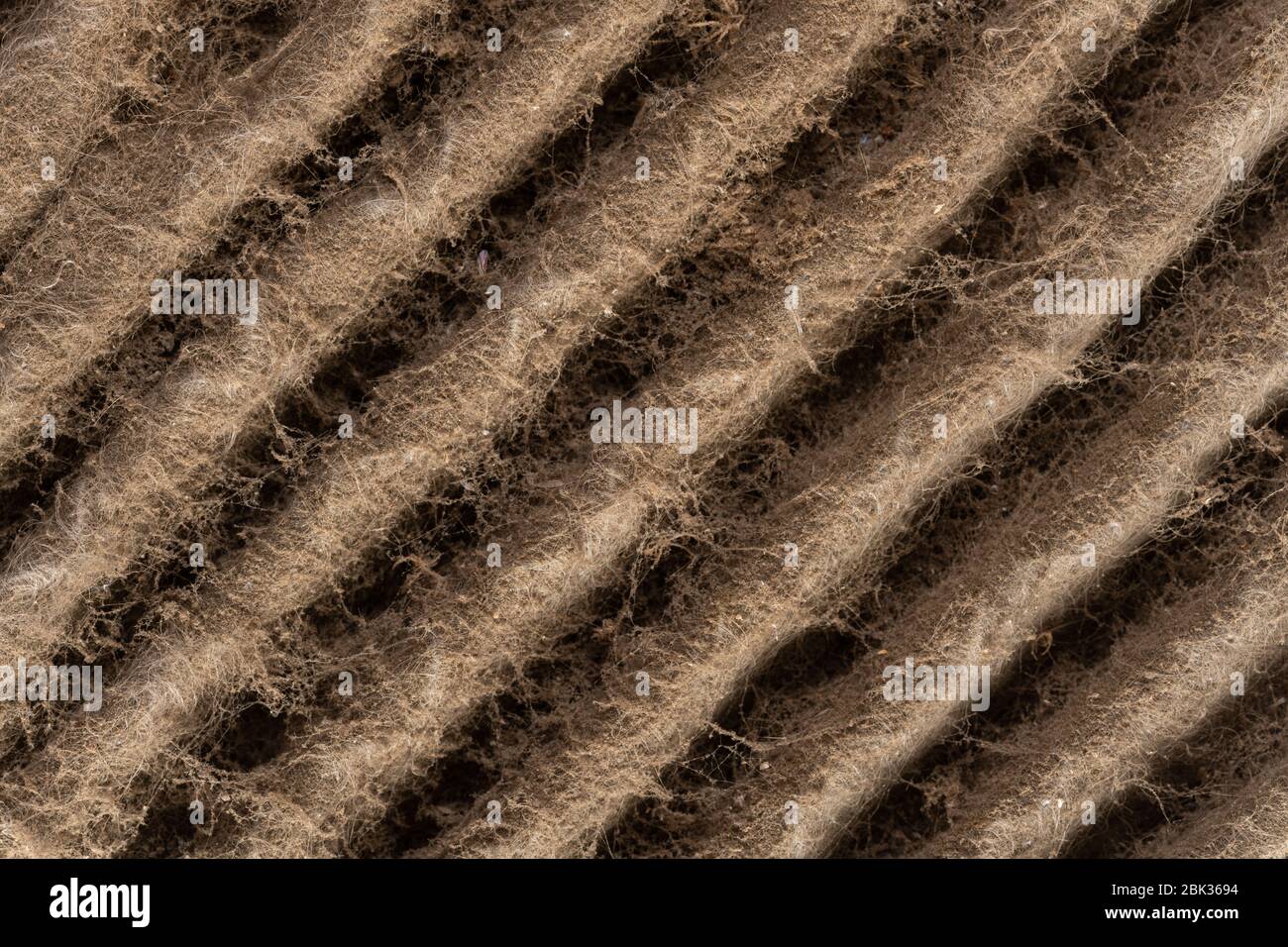 Close up of HVAC home air filter showing the dirt and particle cause ...