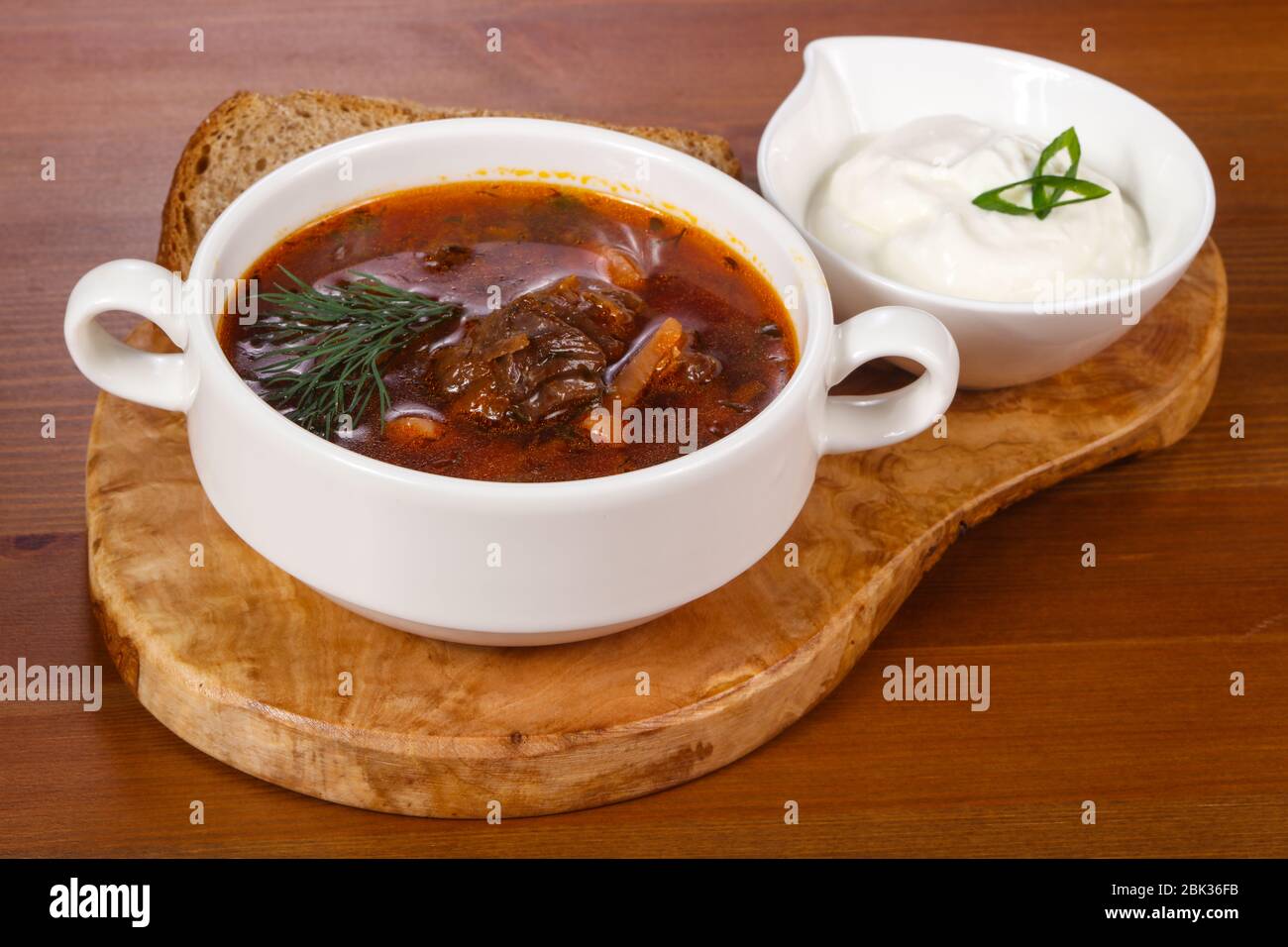 Traditional Russian borsch with beef and sour cream Stock Photo - Alamy